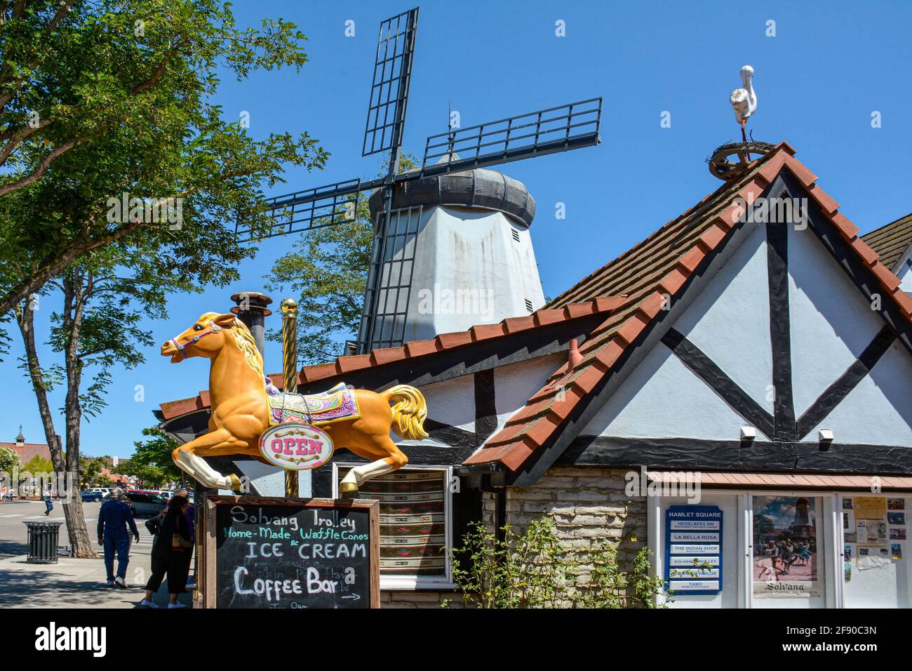 A solo Carousel horse used for advertising the Ice cream shop in front ...