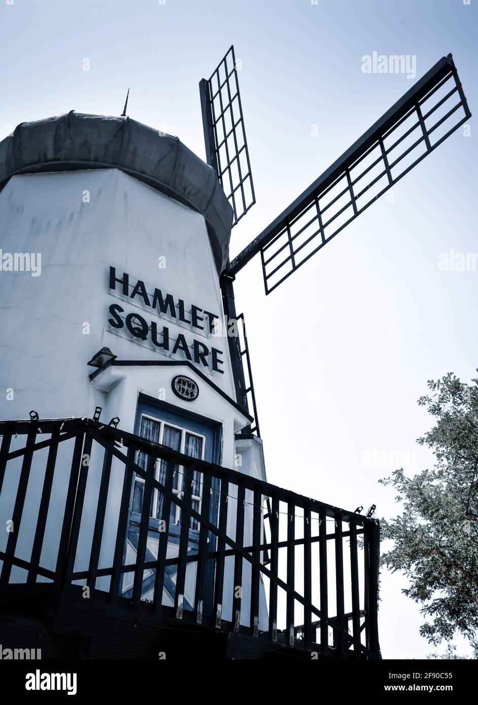 An upward and close up view of the Windmill tower at Hamlet Square, in ...