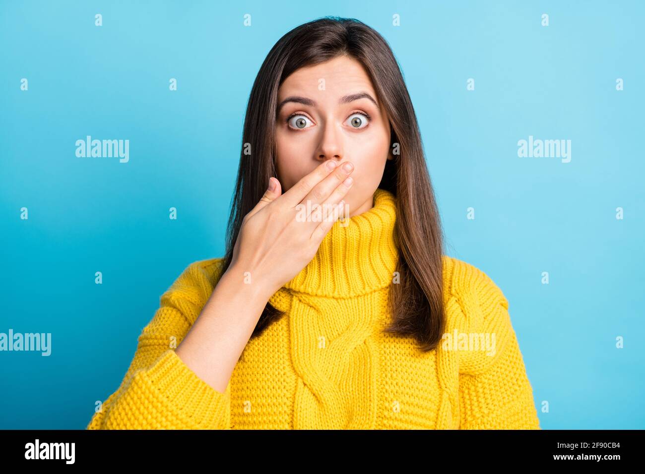 Close Up Portrait Of Attractive Stunned Girl Closing Mouth Dont Gossip Isolated Over Bright Blue