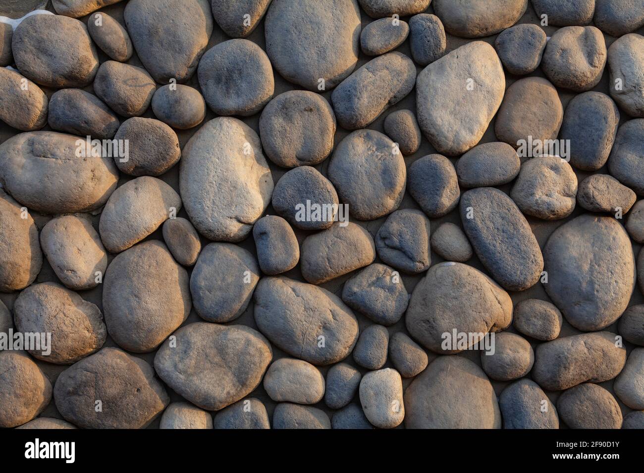 Background image - wall of boulders of different sizes Stock Photo - Alamy