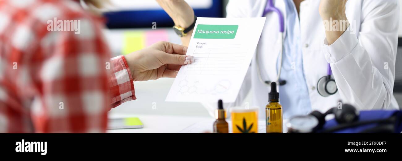 Doctor giving patient prescription for drug in clinic Stock Photo - Alamy