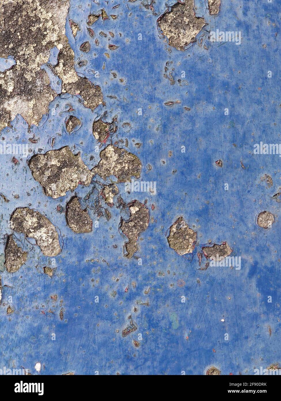 Close-up vertical shot of aged decayed rusty blue metal surface for ...