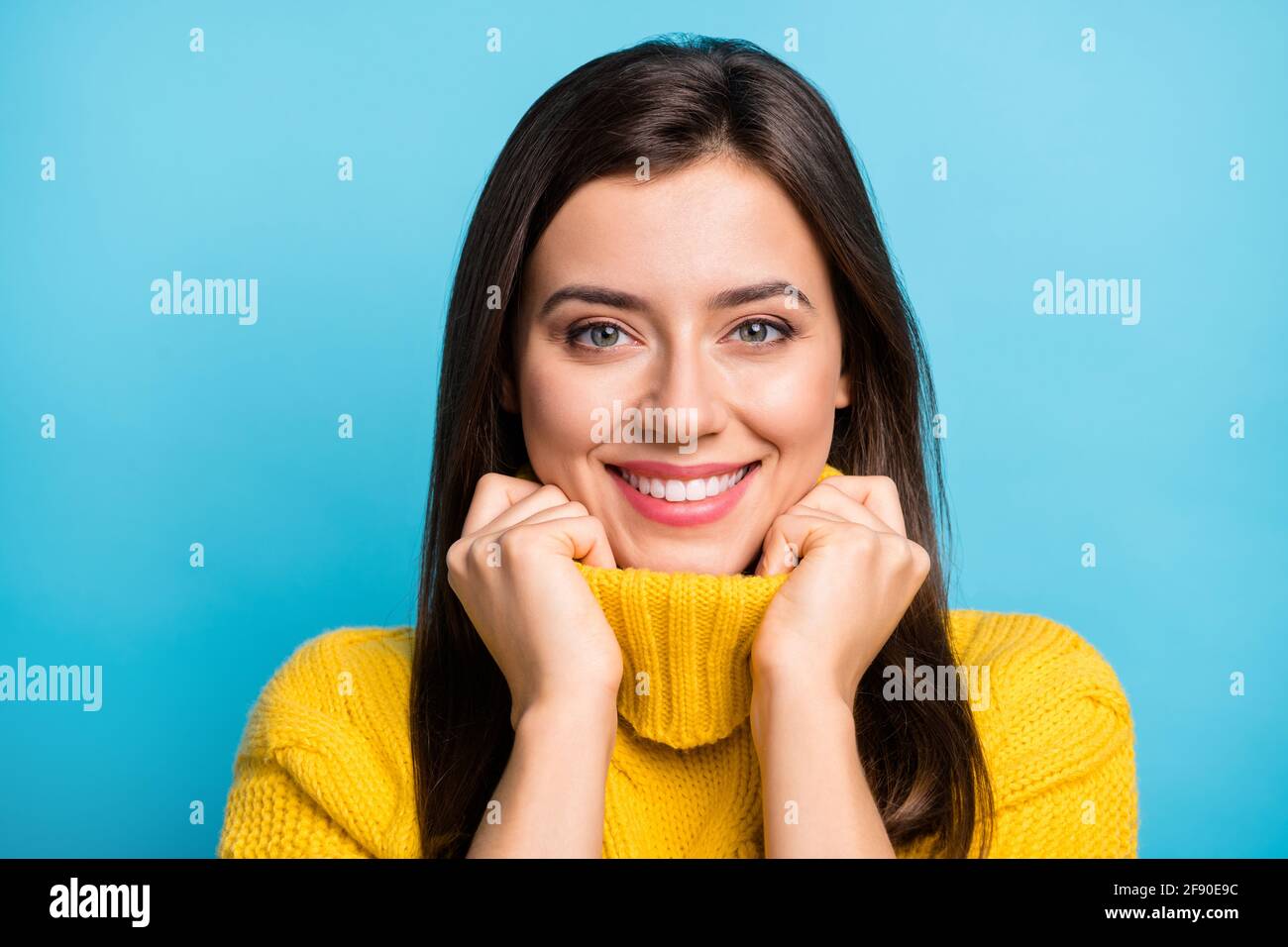 Photo of sweet adorable young lady wear yellow hand arms sweater ...