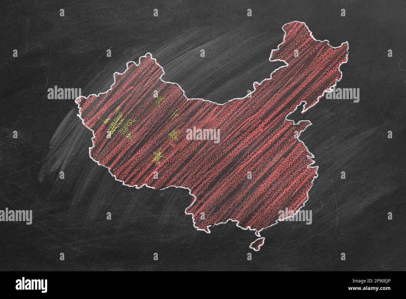 Country map and flag of China drawing with chalk on a blackboard. One ...