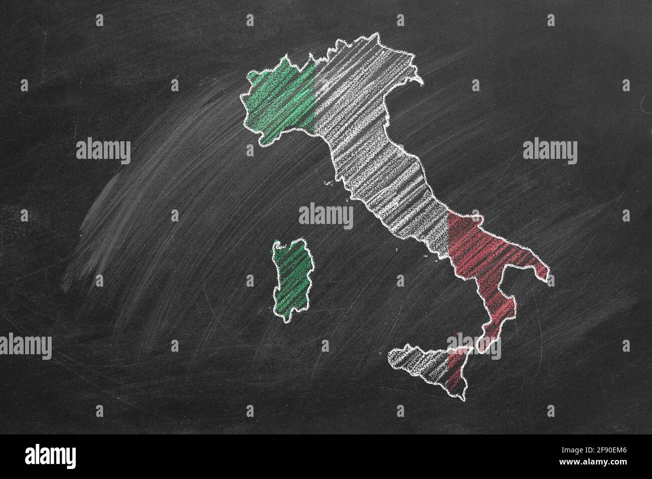 Country map and flag of Italy drawing with chalk on a blackboard. One ...