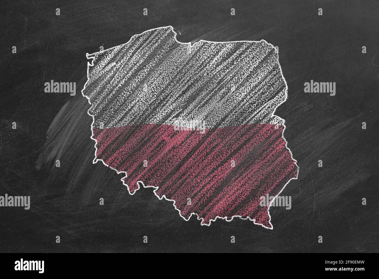Country map and flag of Poland drawing with chalk on a blackboard. One ...