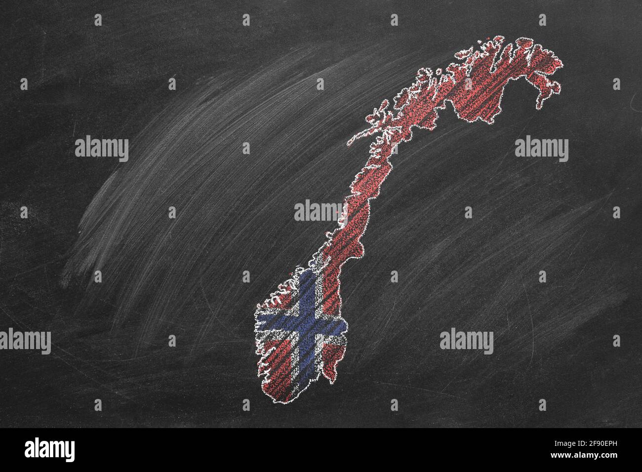 Country map and flag of Norway drawing with chalk on a blackboard. One ...
