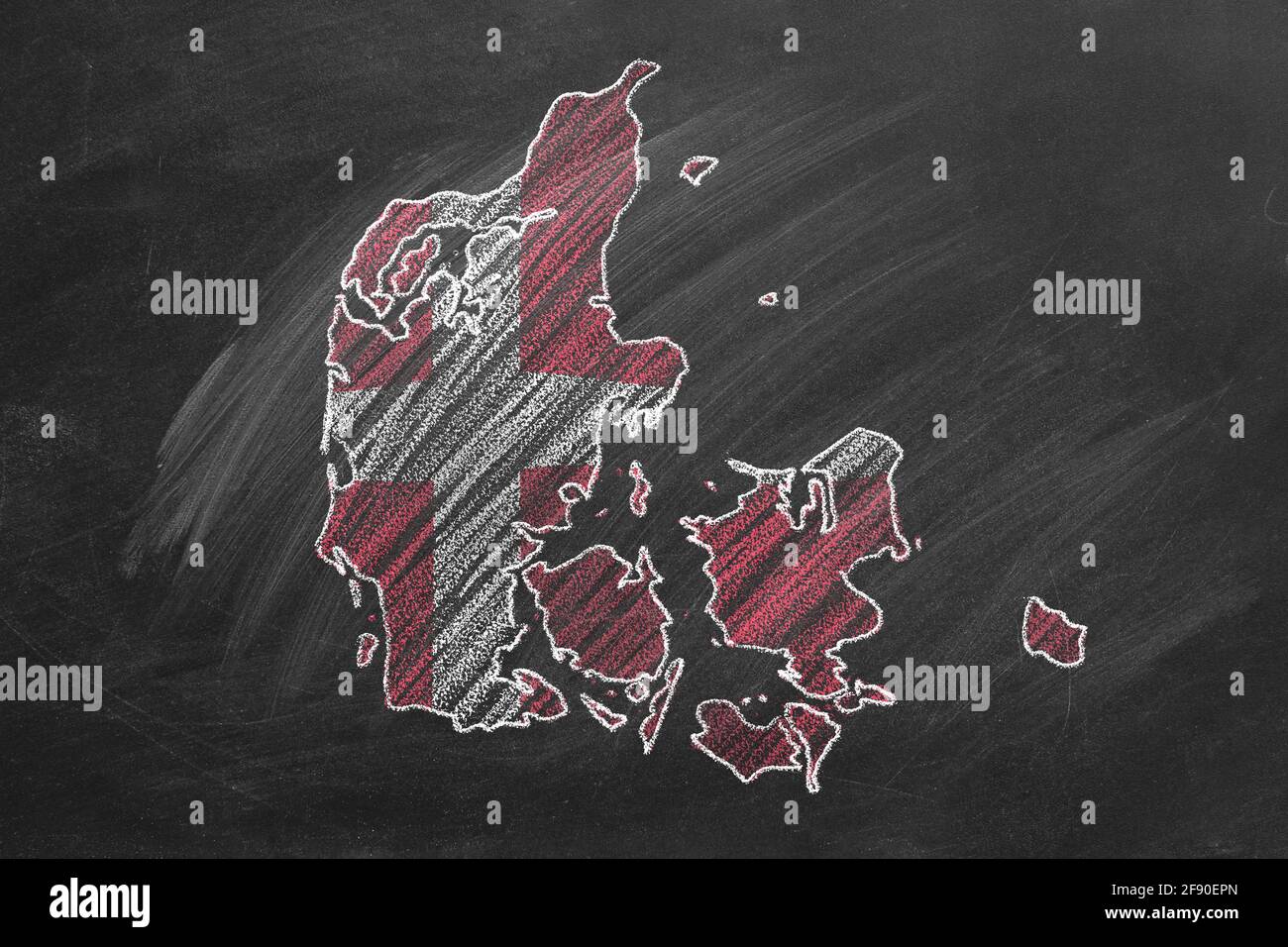 Country map and flag of Denmark drawing with chalk on a blackboard. One ...