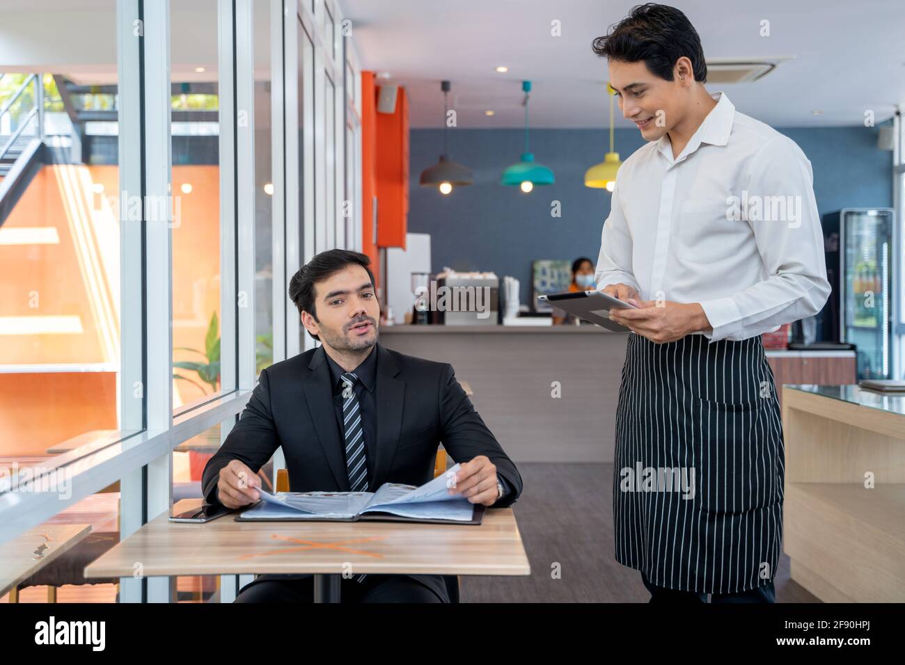 Retail staff apron hi-res stock photography and images - Alamy