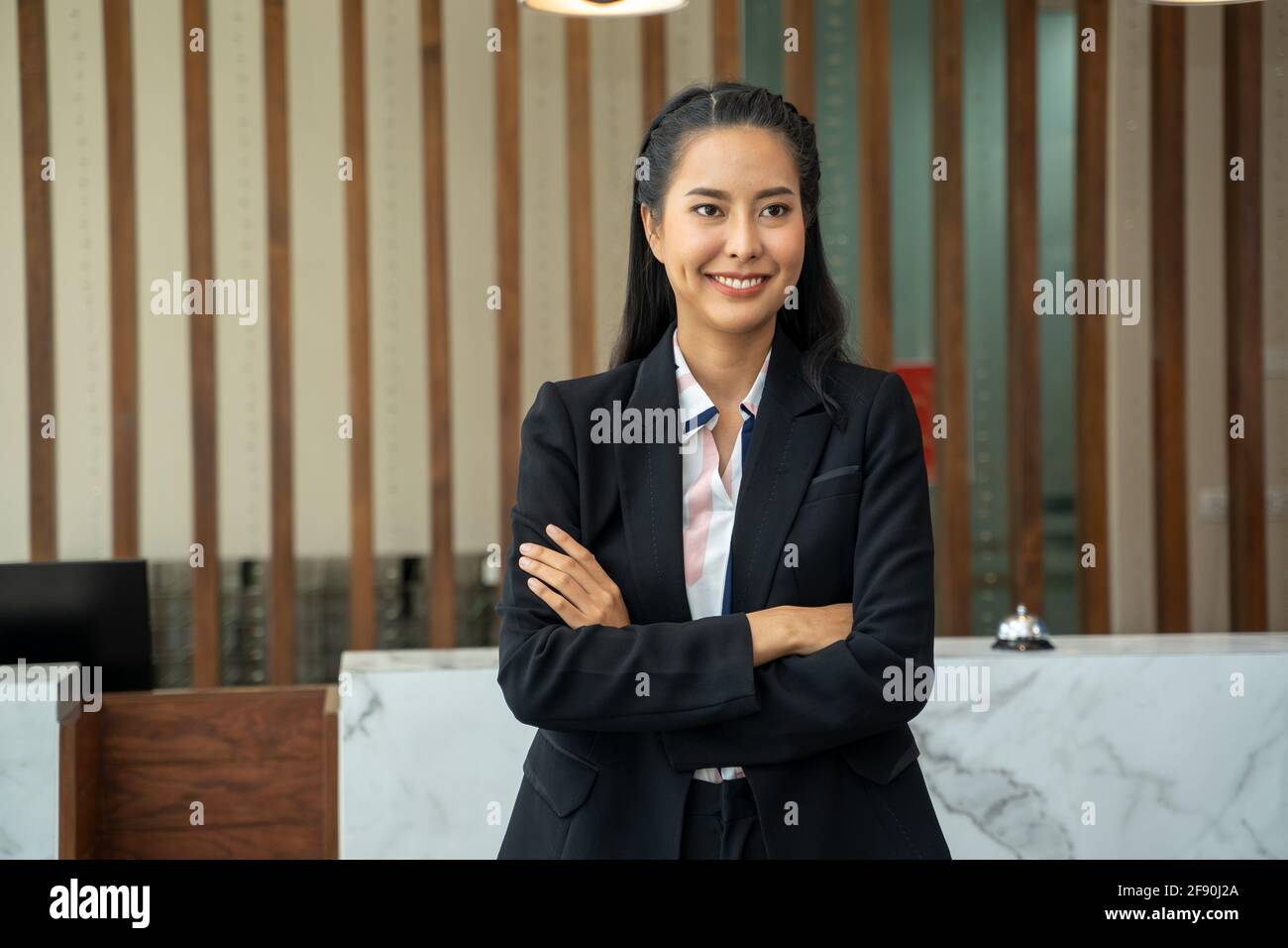 Hotel reception desk manager hi-res stock photography and images - Alamy