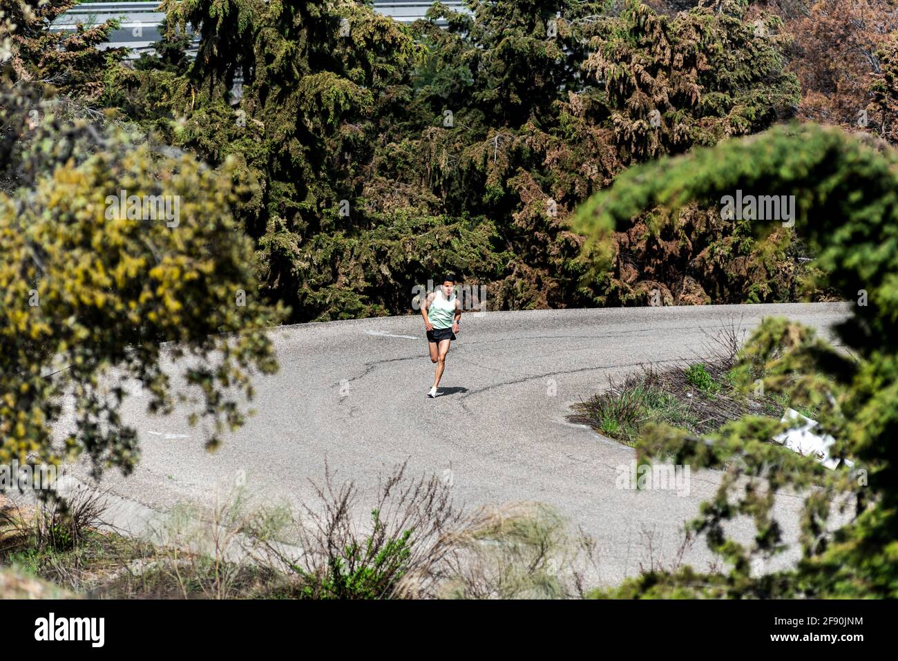 Running a winding road hi-res stock photography and images - Alamy