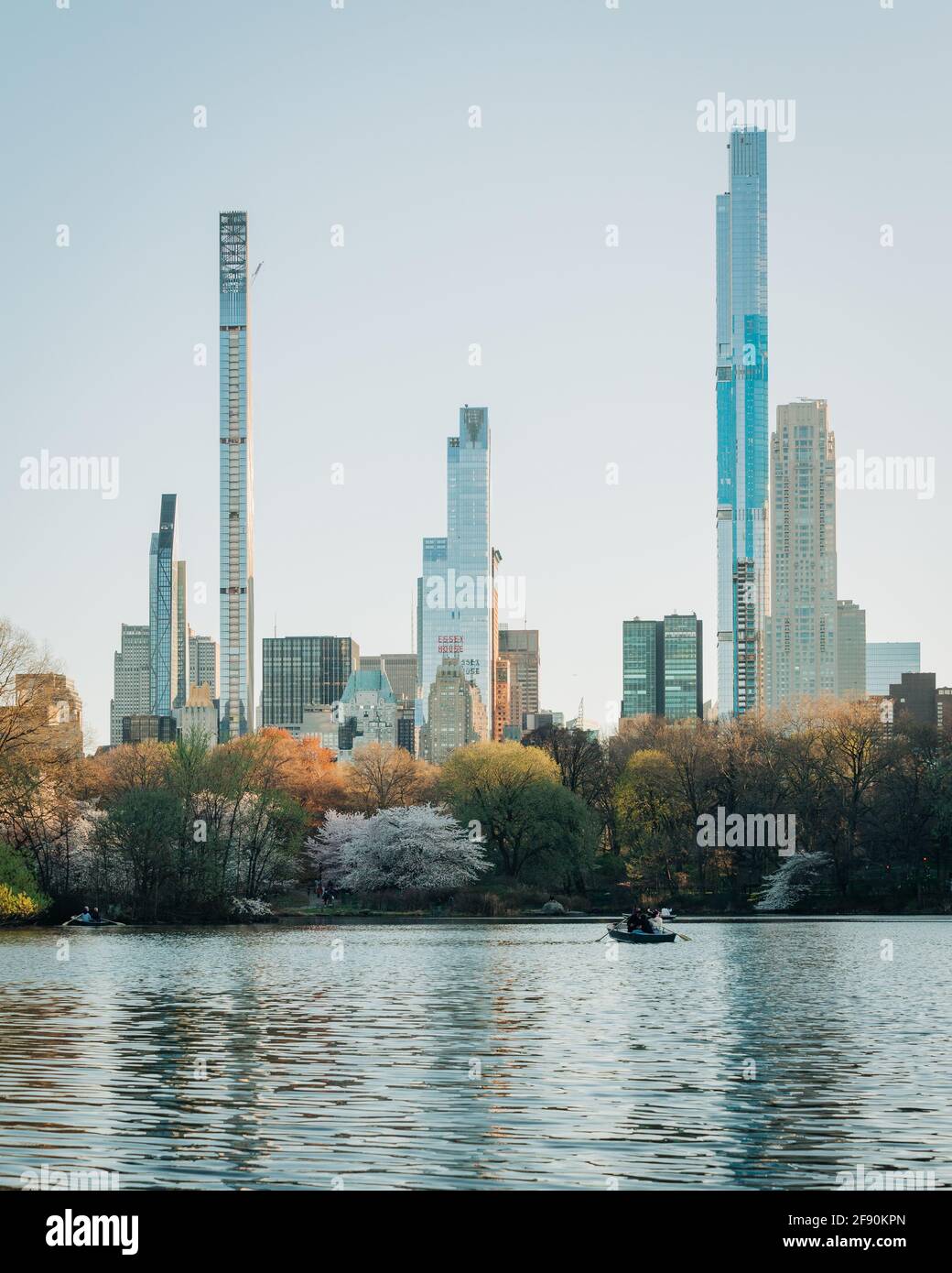 Spring colors at The Lake and view of the Midtown Manhattan skyline, in ...