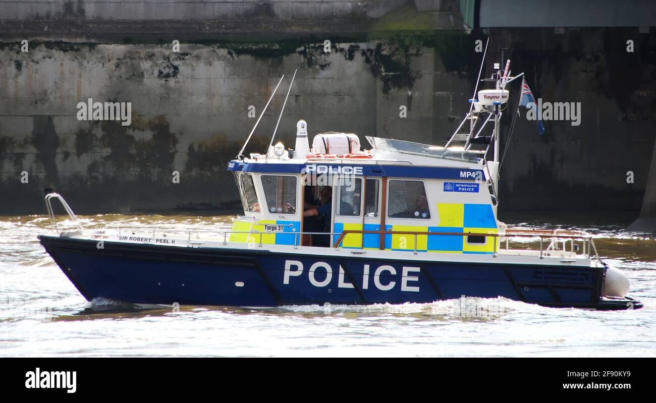 English patrol Police boat patrolling on the River Thames. London Stock ...