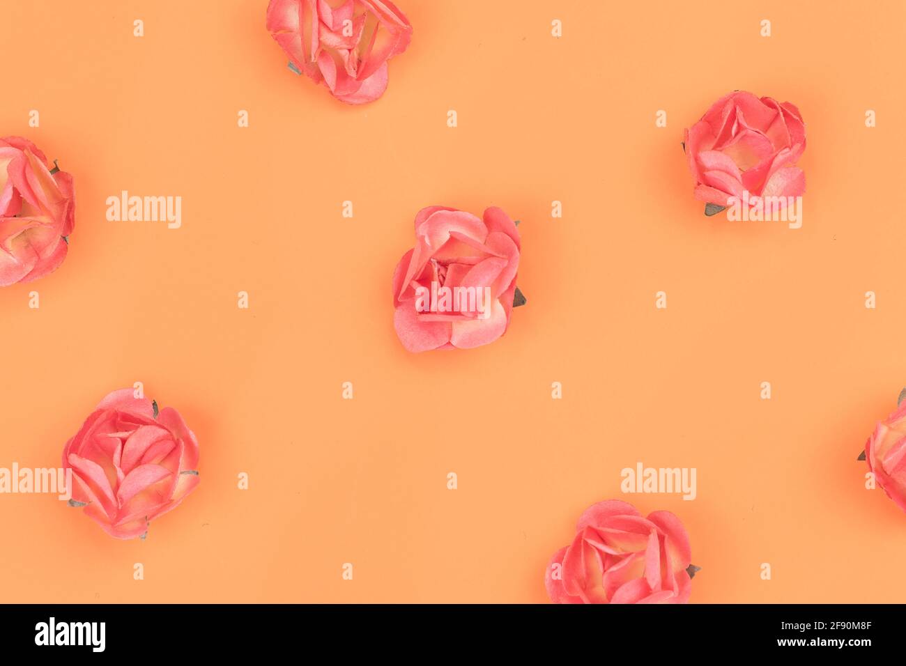 orange background with orange flowers embossed and textured Stock Photo ...