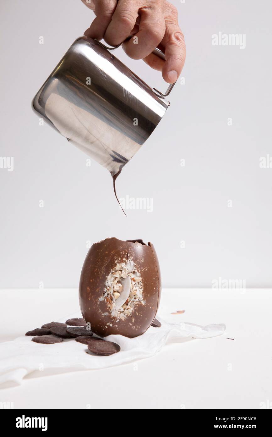 Melted chocolate egg hi-res stock photography and images - Alamy