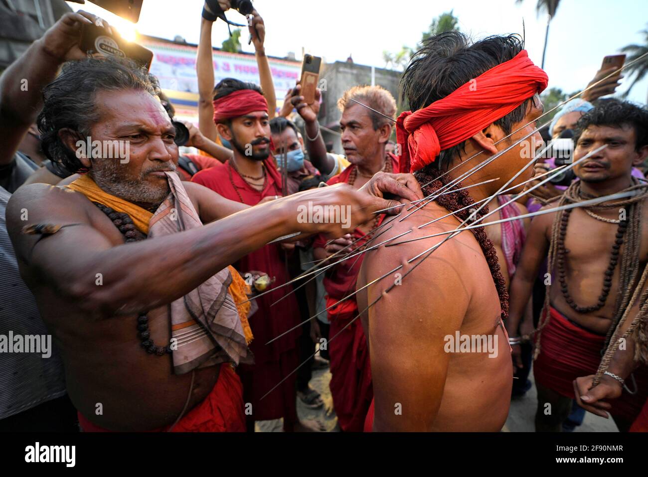 Devotee doing puja hi-res stock photography and images - Alamy