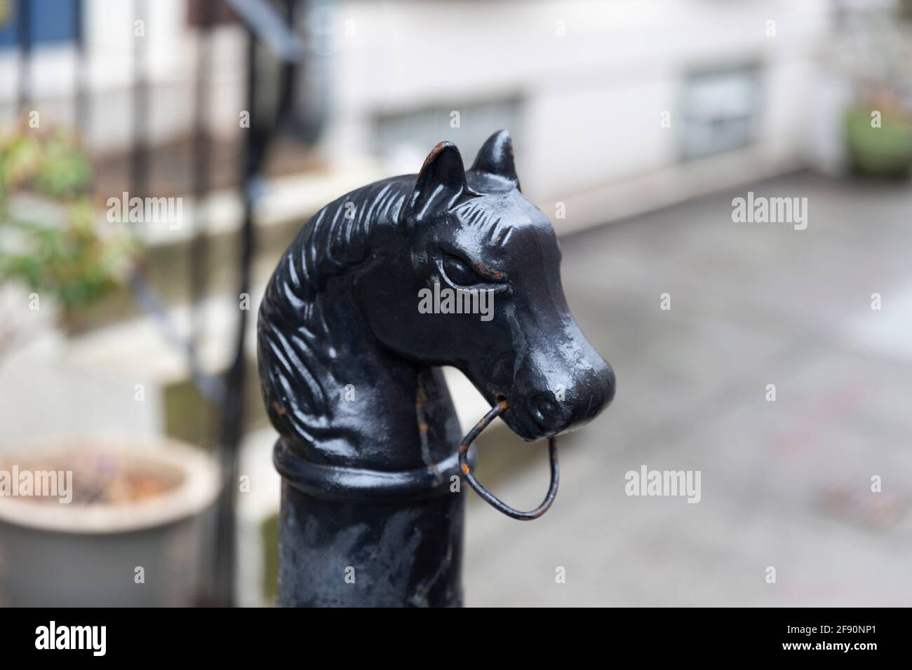 Philadelphia, PA - March 26 2021: Metal black horse head hitching post ...
