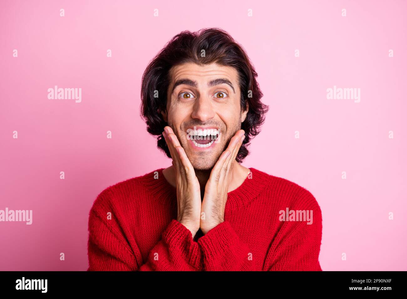 Portrait Of Young Handsome Happy Excited Amazed Cheerful Man Hold Hands