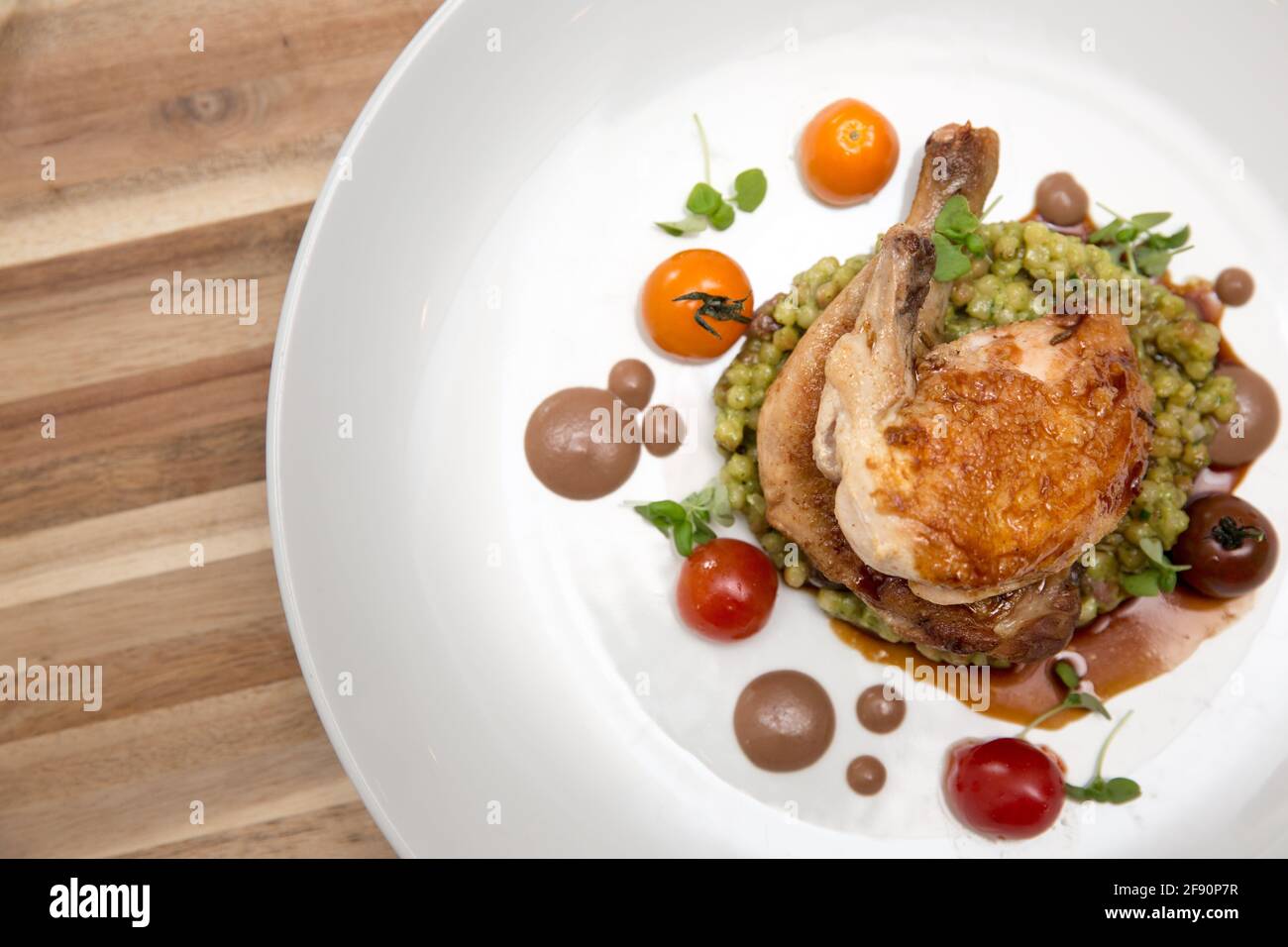 Top view of a gourmet fancy dish with chicken and vegetables Stock ...