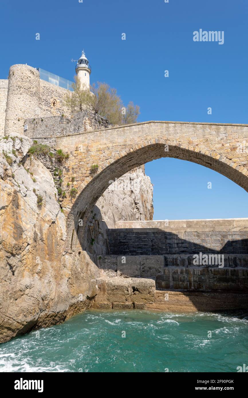 Vertical shot of the Medieval Bridge of Castro Urdiales under the ...