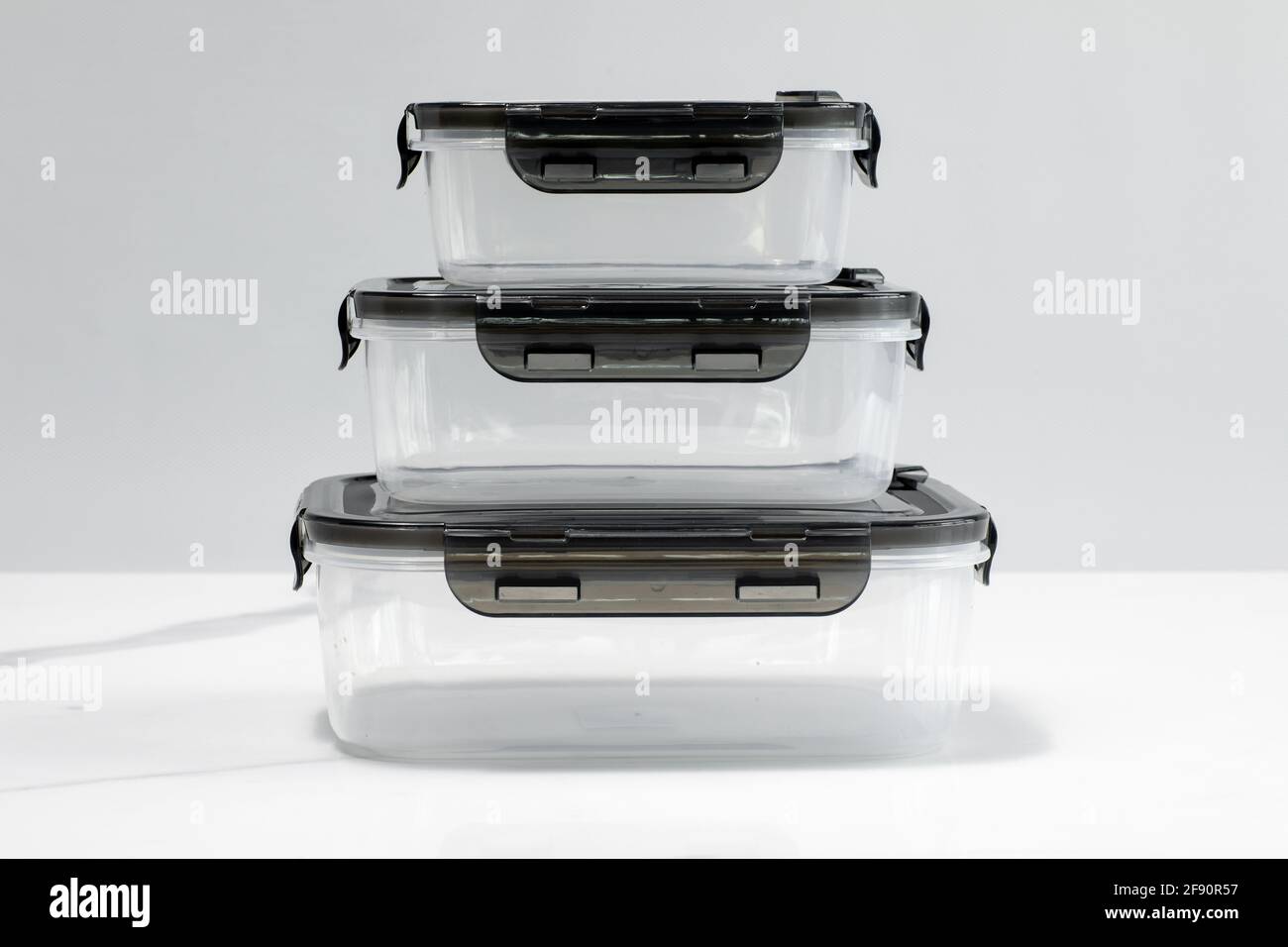 Set of plastic containers on white background Stock Photo - Alamy