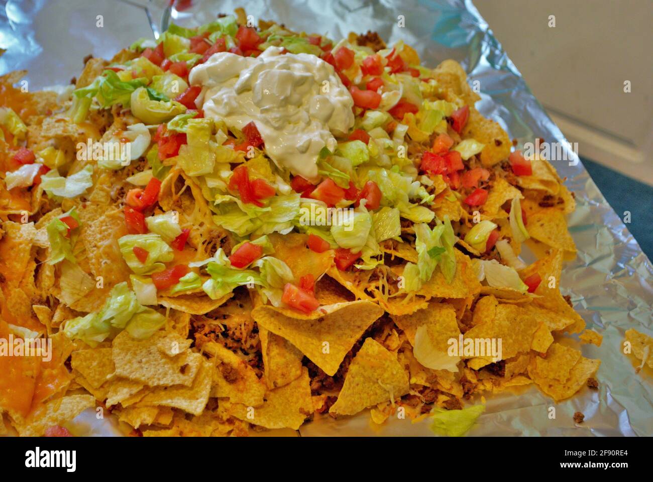 Nacho table kitchen table wrapped in aluminum foil and covered with ...