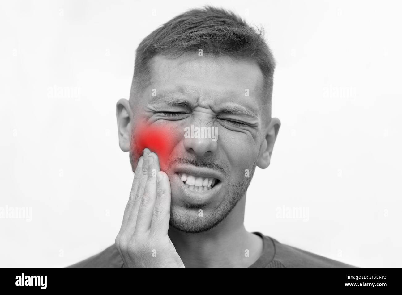 Man face with strong tooth pain with red highlighted area. Man ...
