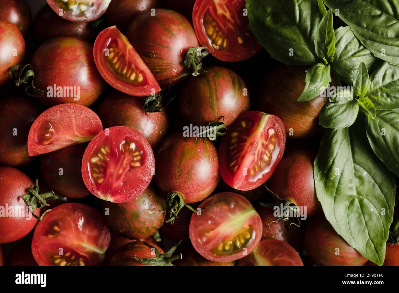 Sliced cherry tomatoes in hi-res stock photography and images - Alamy