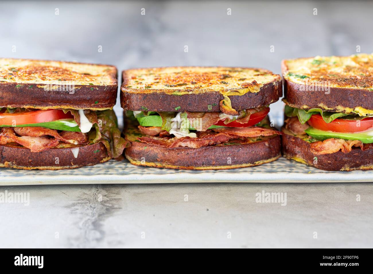 French Toast B.L.A.T Bacon Lettuce and Tomato toastie Stock Photo - Alamy