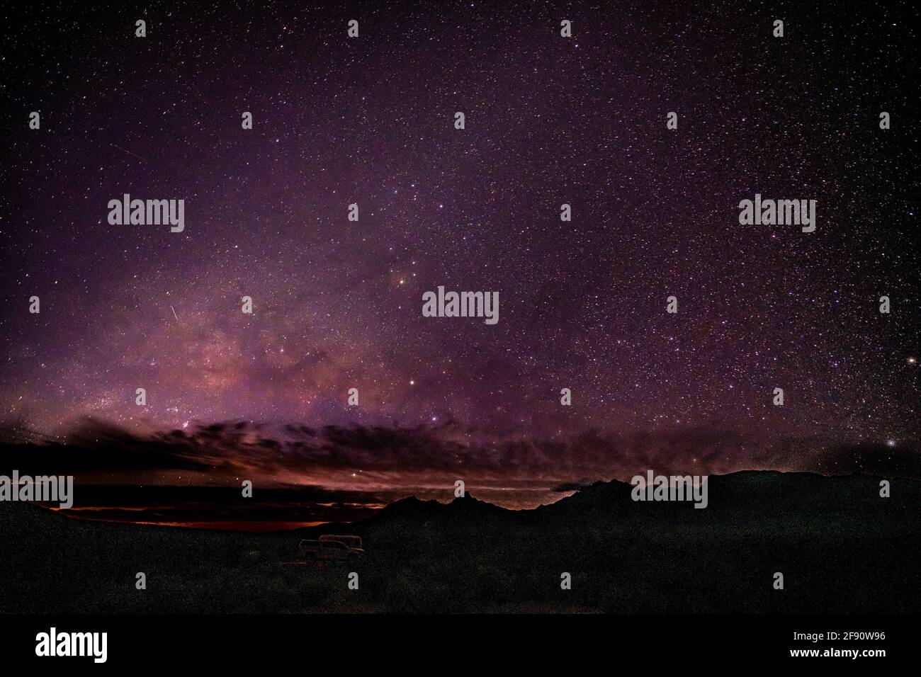 Vast Stars Over Big Bend National Park wilderness with rising sun and ...