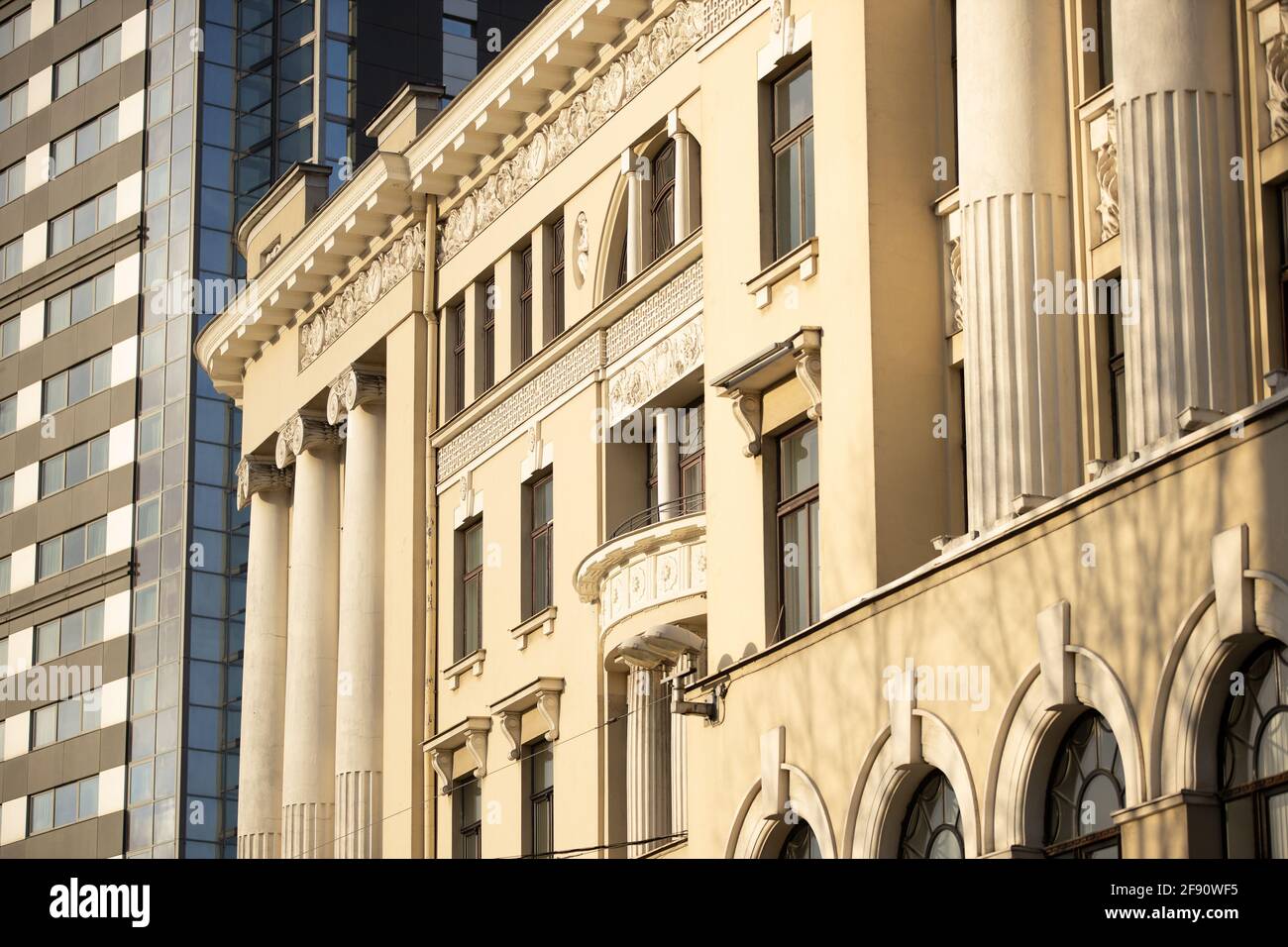 Beautiful view of several windows around balcony on the facade of an ...