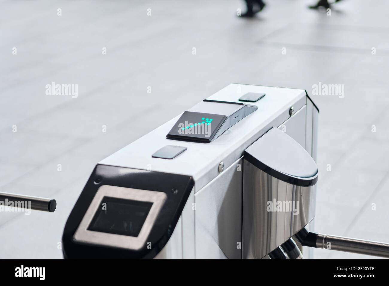 Metal turnstile with forward arrow to signal passage permitted Stock ...