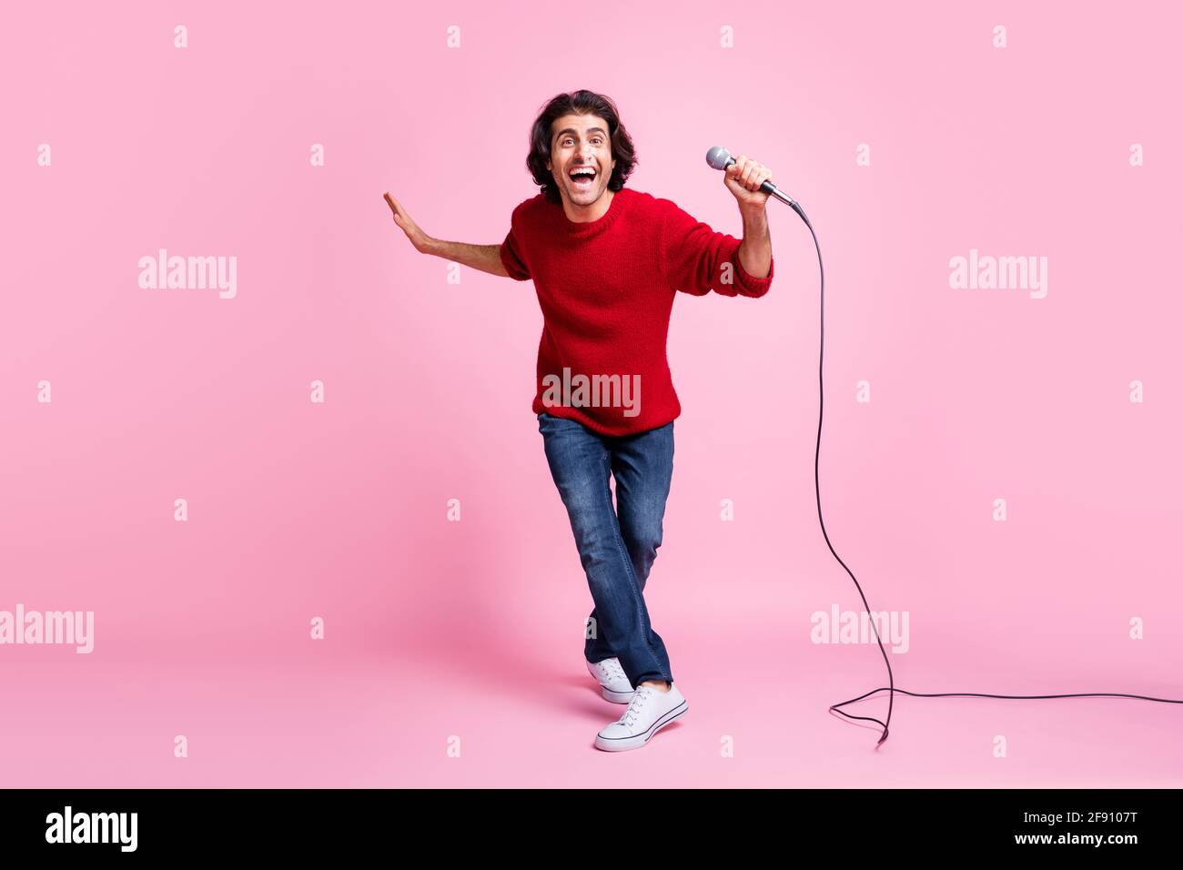 Full size photo of young attractive man happy excited smile sing ...