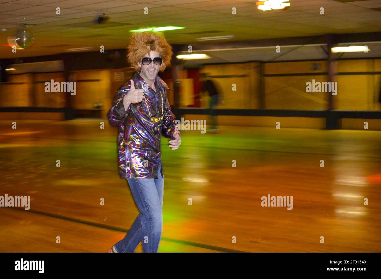 '70s Rollerskating Party at Roller Rink Stock Photo - Alamy