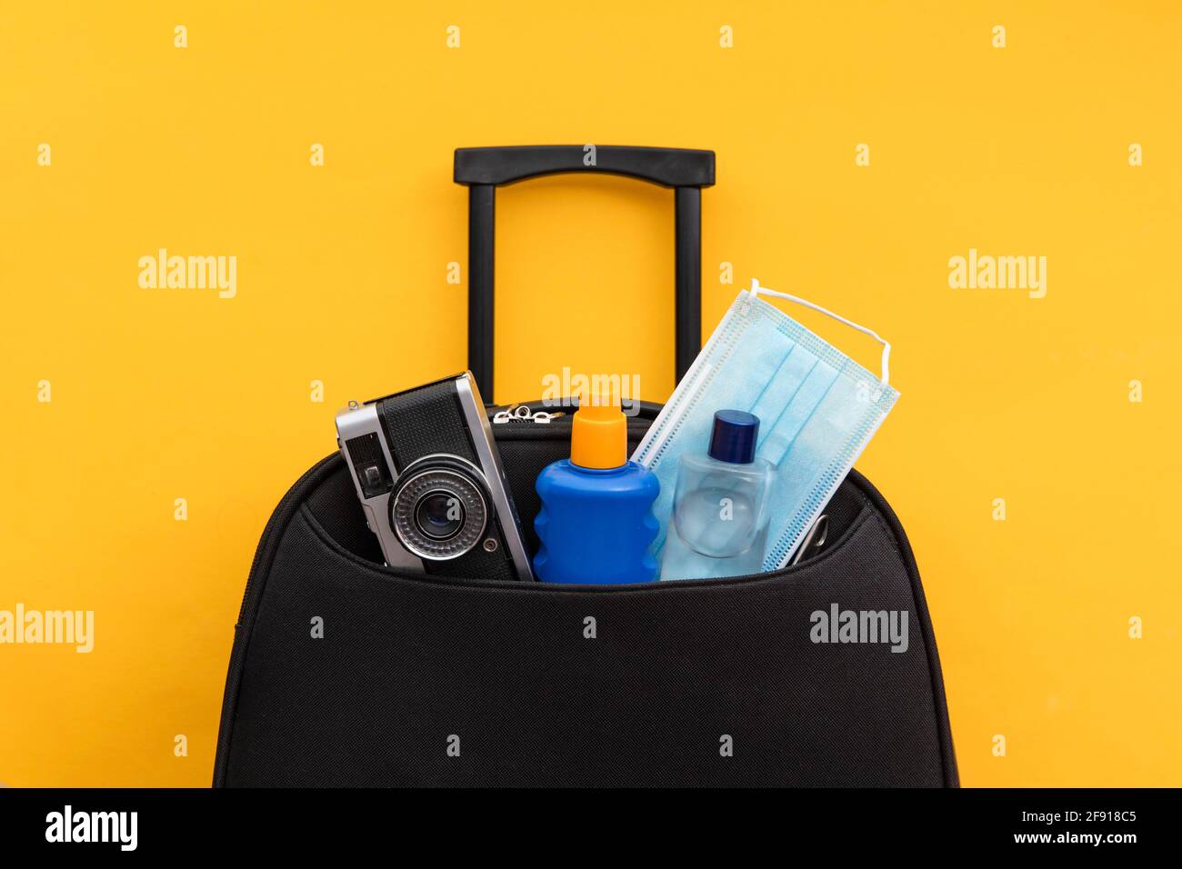 Suitcase packed for a vacation during coronavirus covid pandemic Stock ...