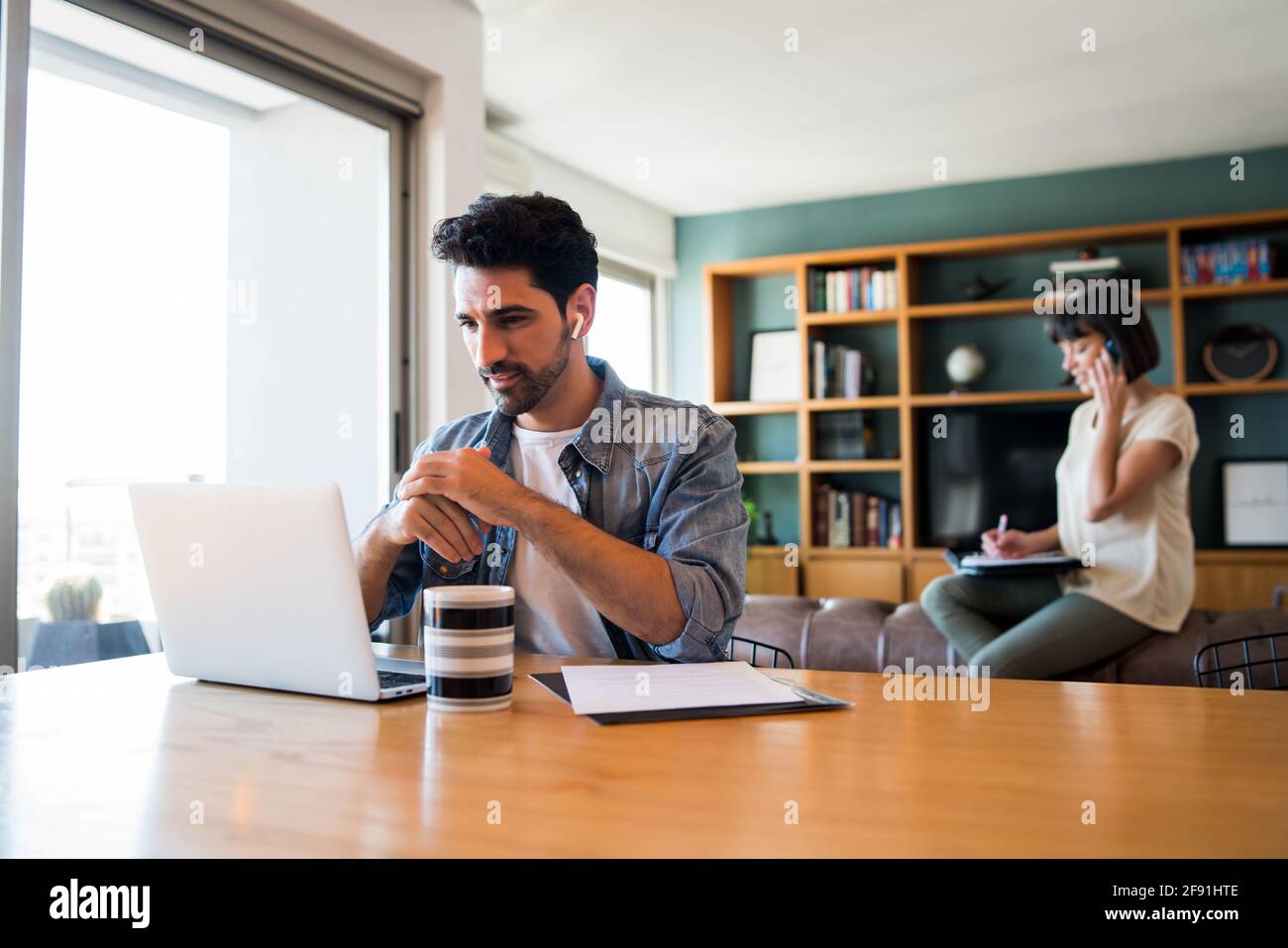 Business man working with laptop from home Stock Photo - Alamy