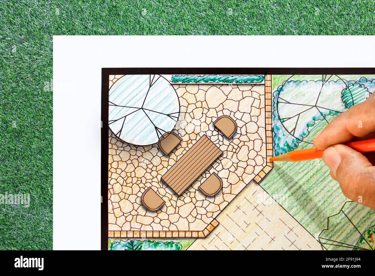 Landscape architect design patio in backyard garden plan Stock Photo ...