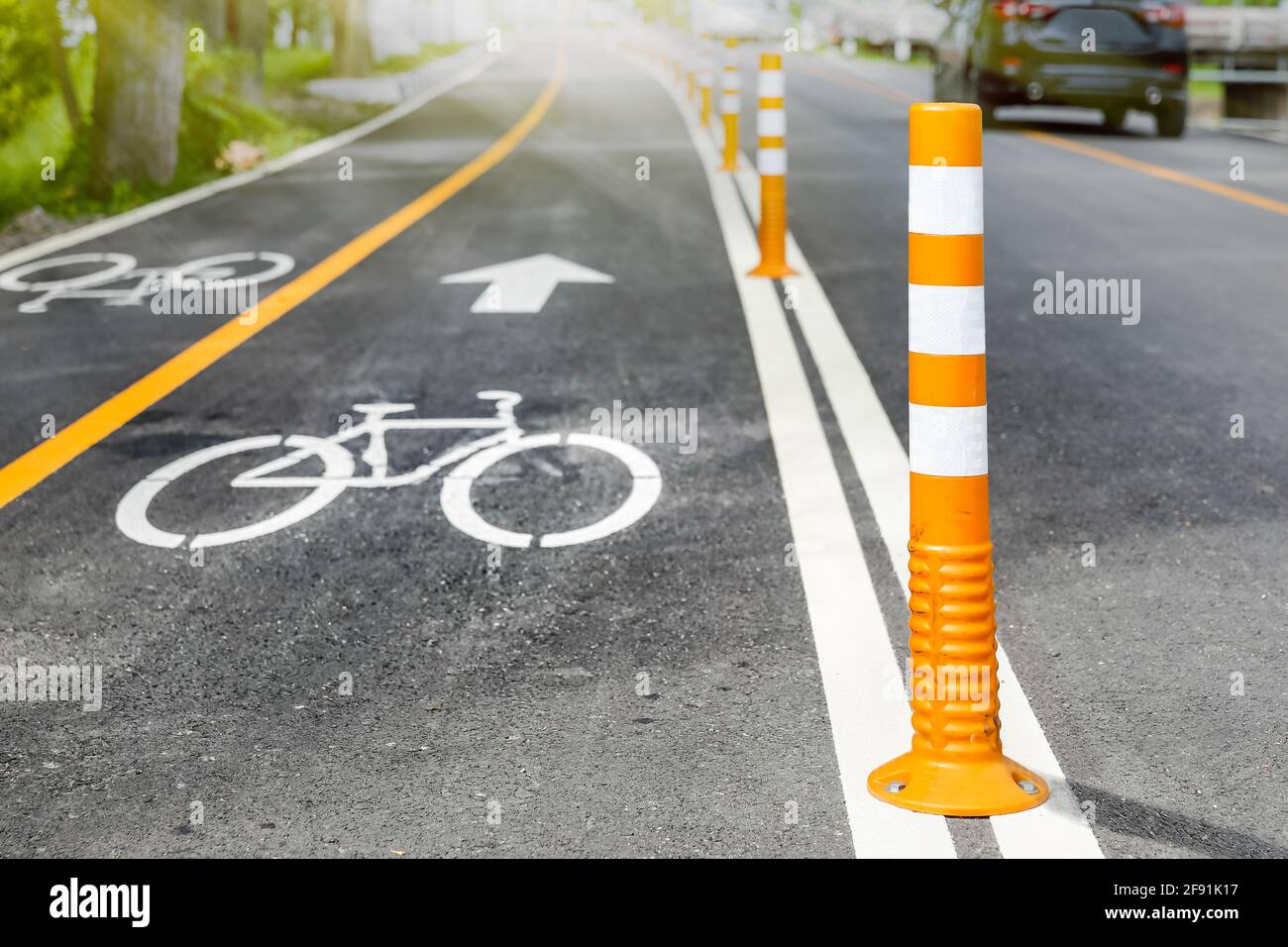 Flexible traffic bollard for bike lane Stock Photo - Alamy