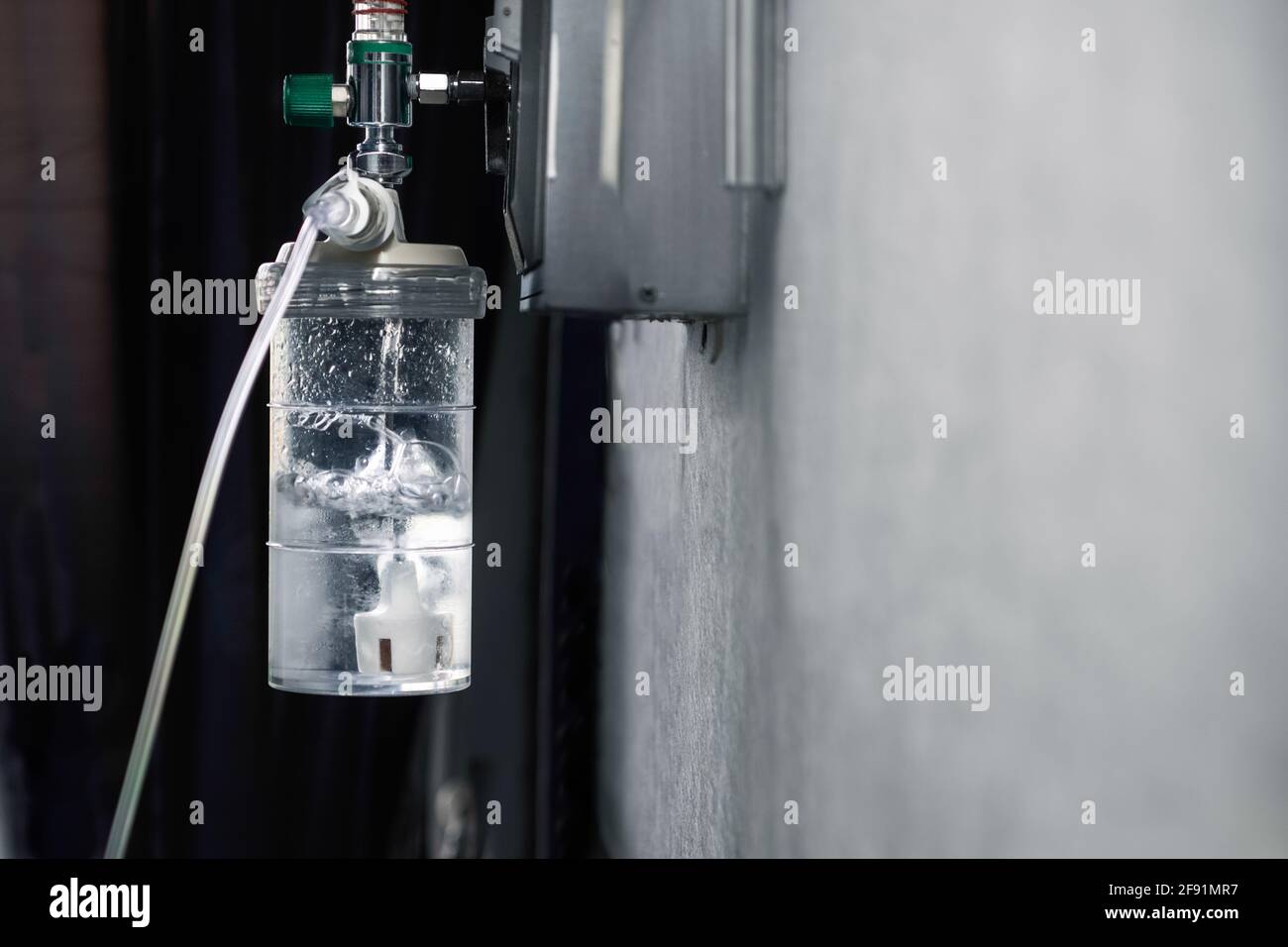 Oxygen regulator with humidifier medical equipment at hospital room ...