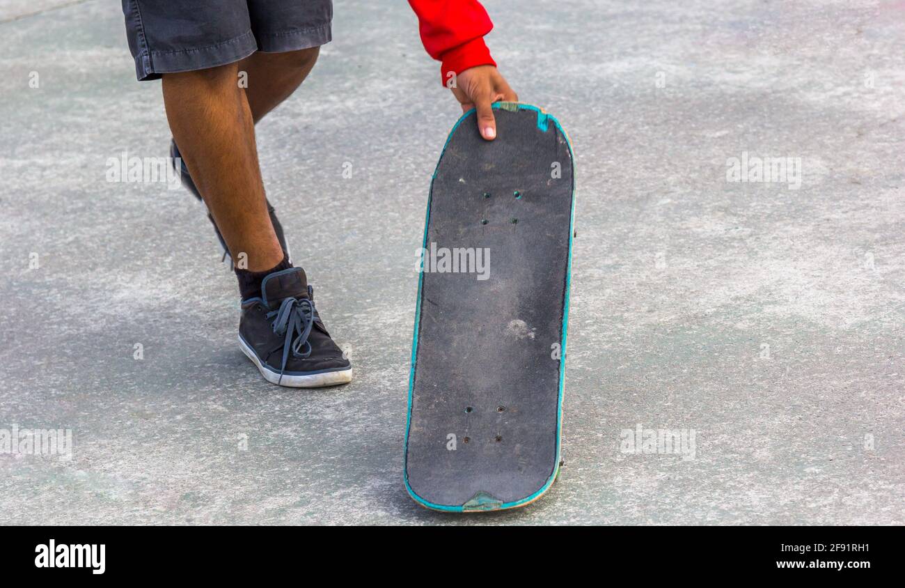 Close-up shot of a skateboarder at the skate park Stock Photo - Alamy