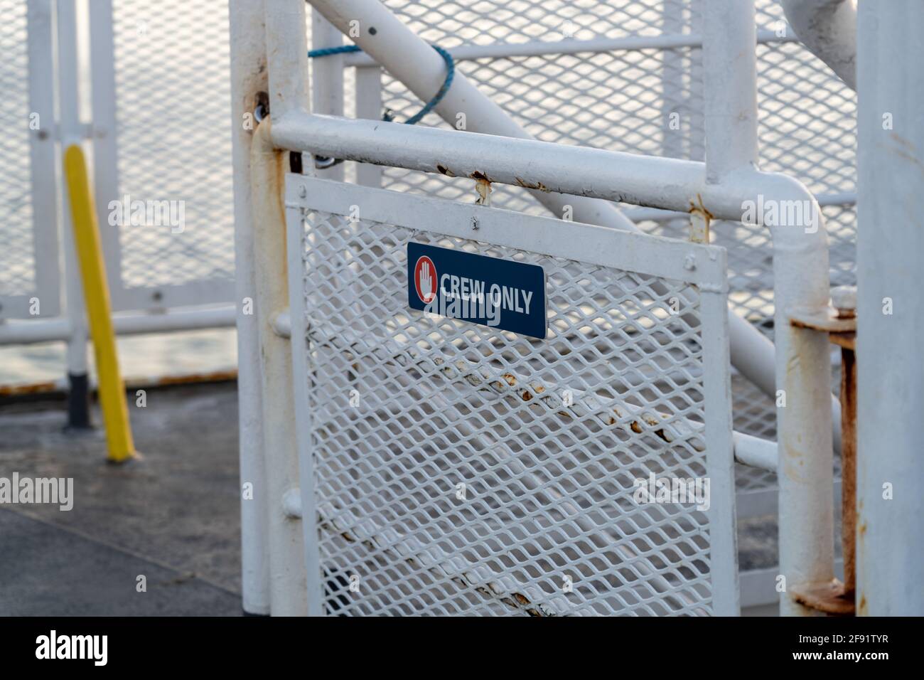 Crew only sign on a passenger ferry. Area for staff Stock Photo - Alamy