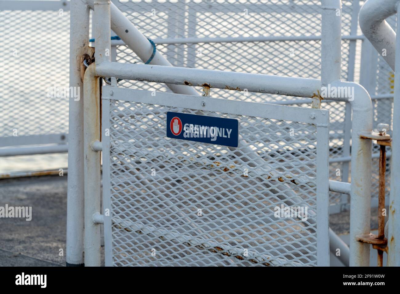 Crew only sign on a passenger ferry. Area for staff Stock Photo - Alamy