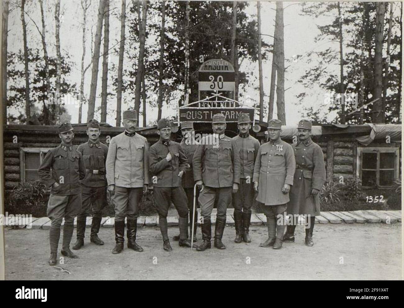 Officers and soldiers posing in front of a soldier home in the section ...
