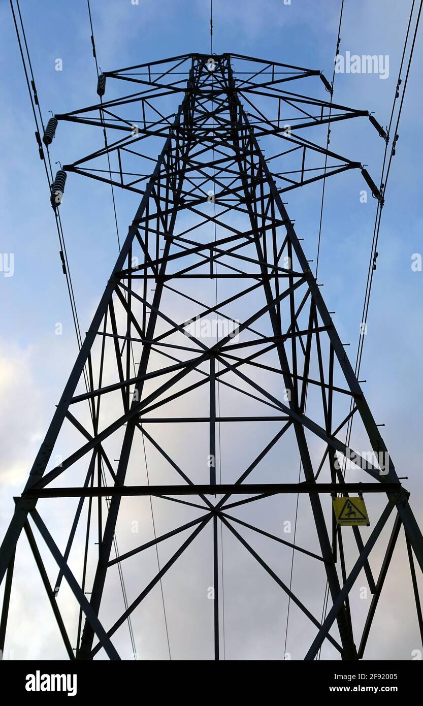 Vertical low angle shot of an electric power transmission tower Stock ...
