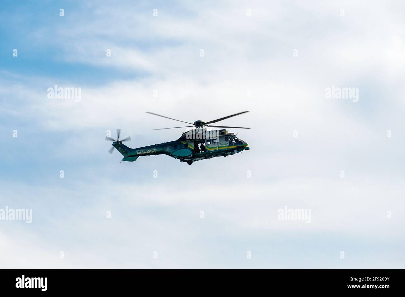 Sheriff Helicopter Hovering on a Beautiful Sky Background. Sheriff ...