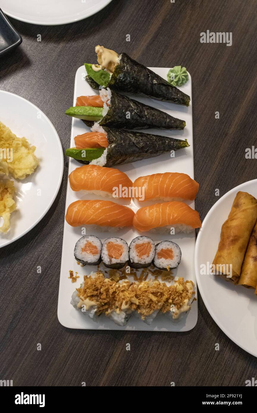 Vertical shot of sushi (nigiri, maki, temaki, uramaki) /Japanese ...