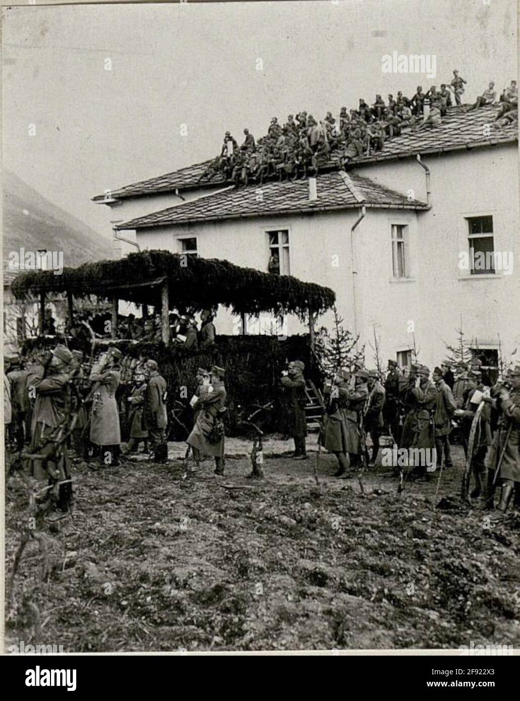 Officers of the 11th Army observe the roll up of a storm wave, Selva ...