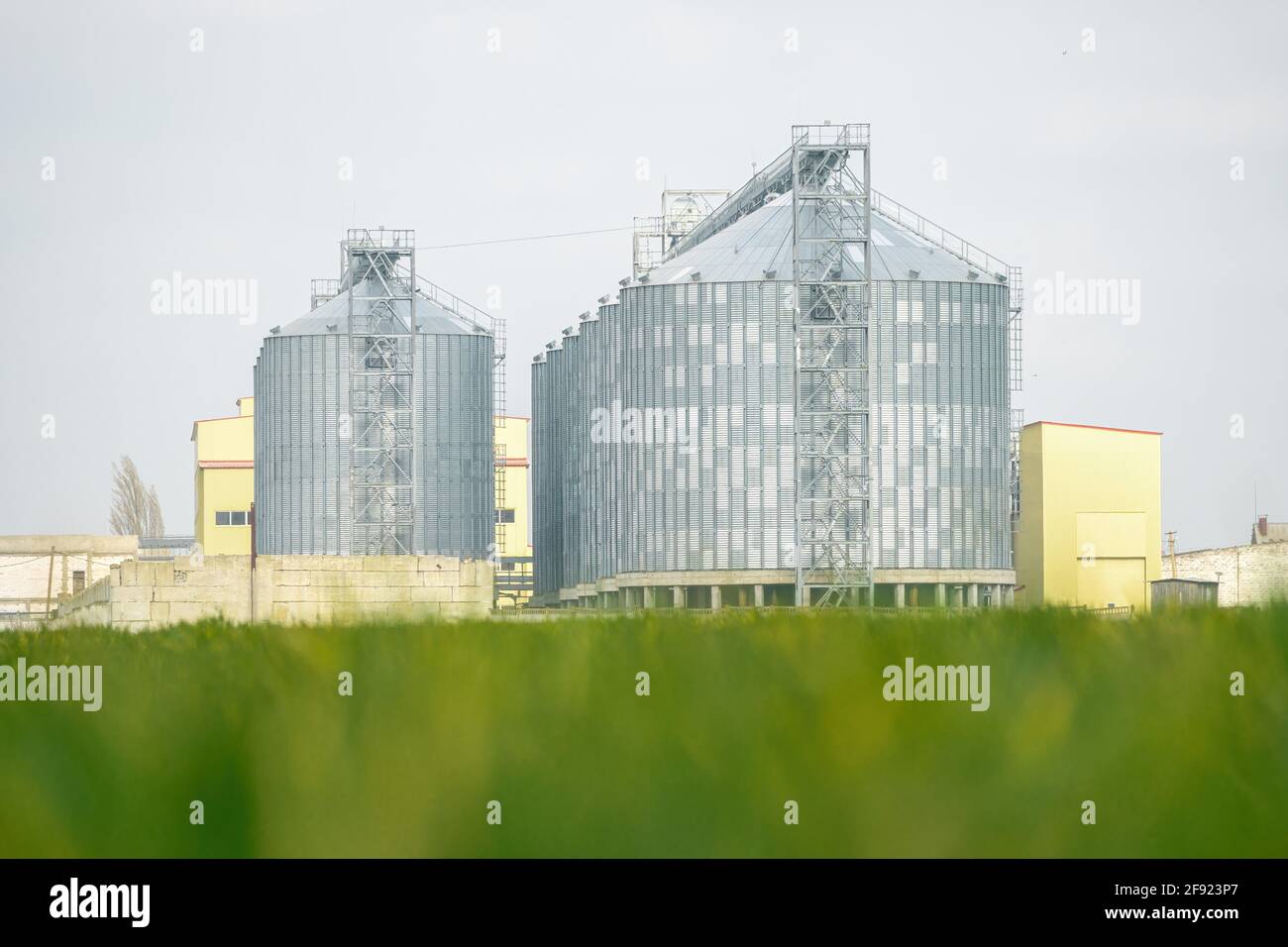 Grain elevator. Metal grain elevator in agricultural zone. Agriculture ...