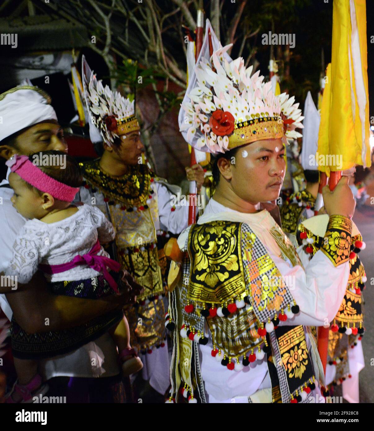 Balinese male dancers dancing during a temple festival in Ubud, Bali ...