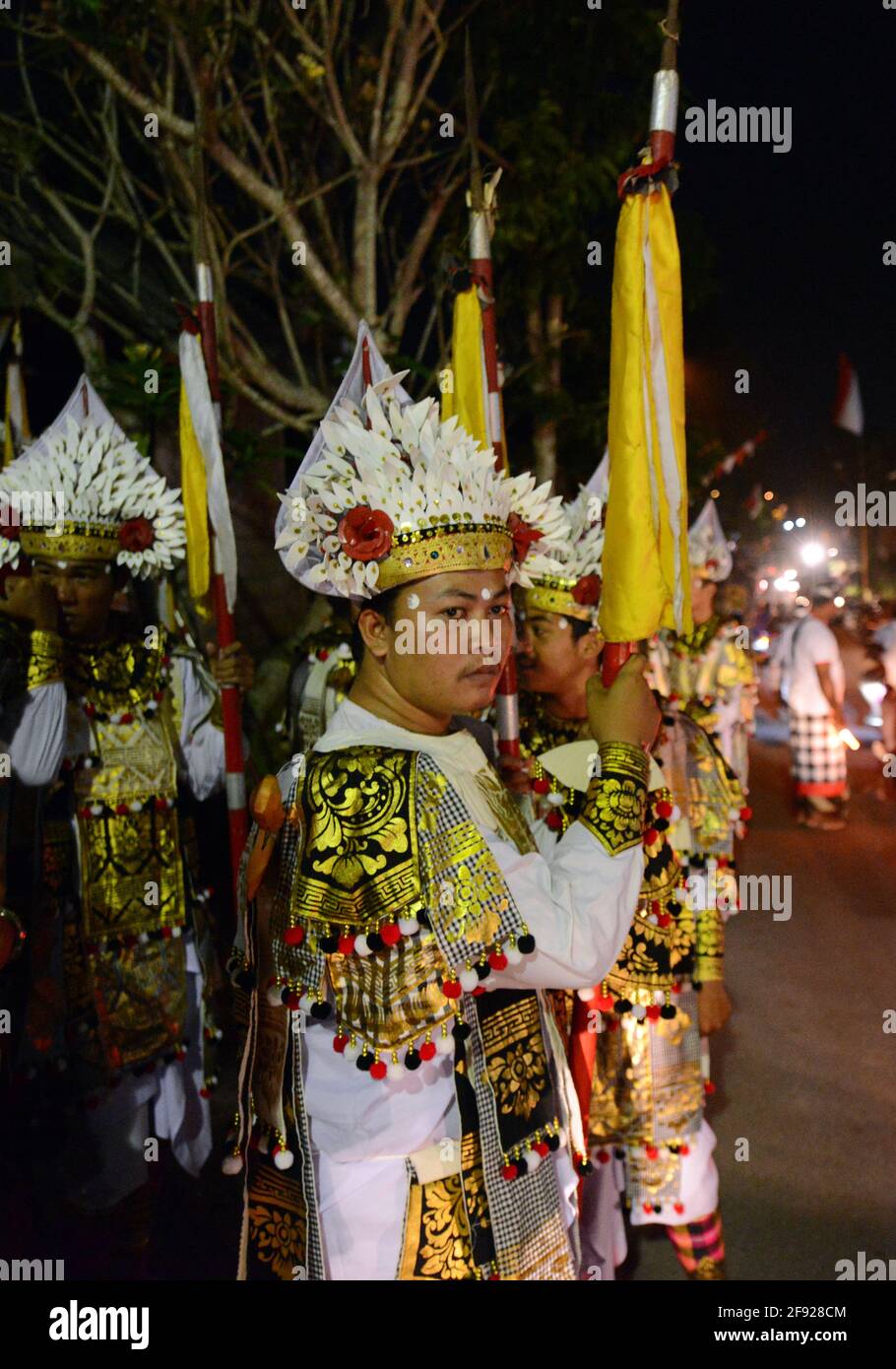 Balinese male dancers dancing during a temple festival in Ubud, Bali ...